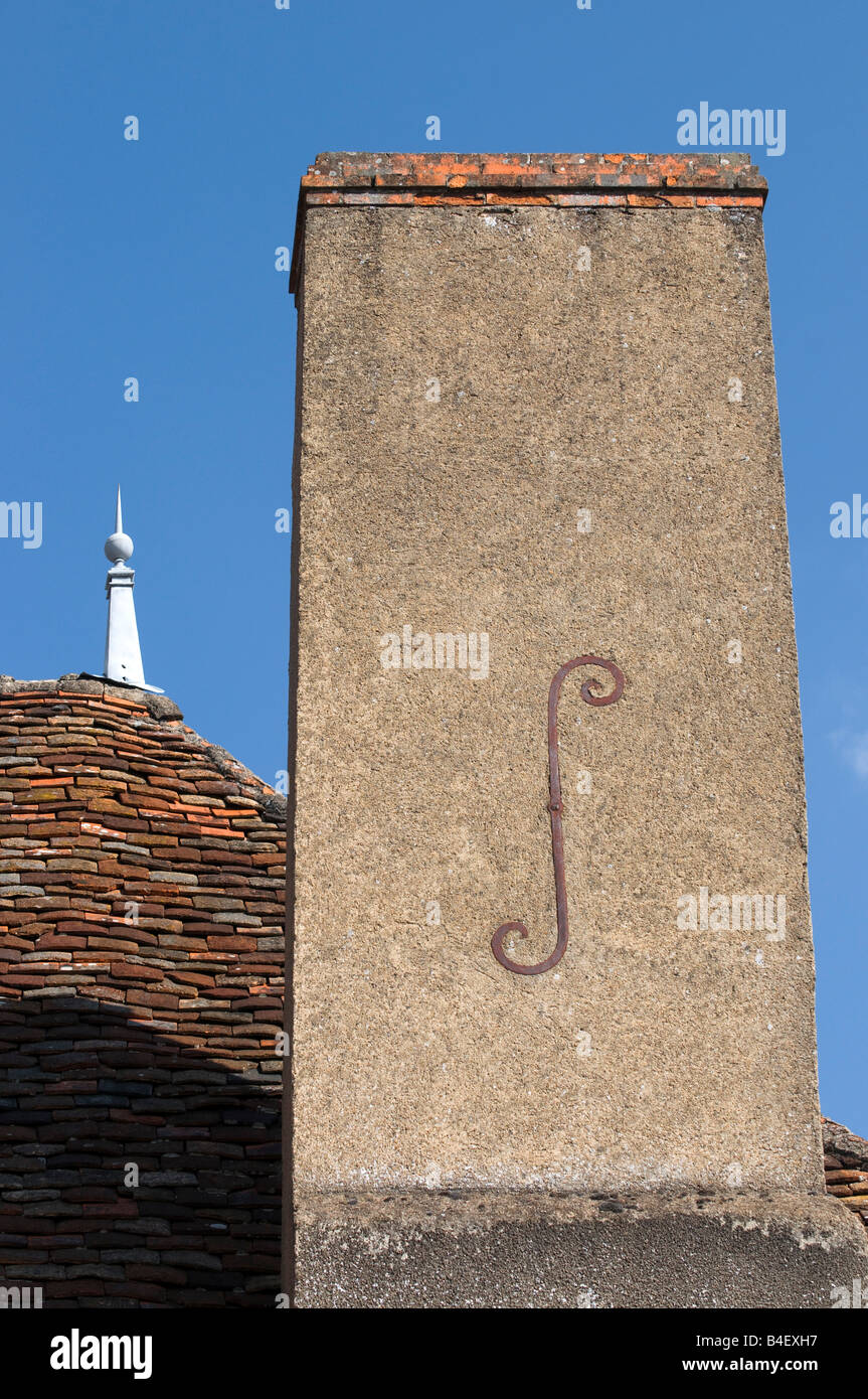 Decorative letter "S" reinforcing chimney stack, Bélabre, France Stock ...