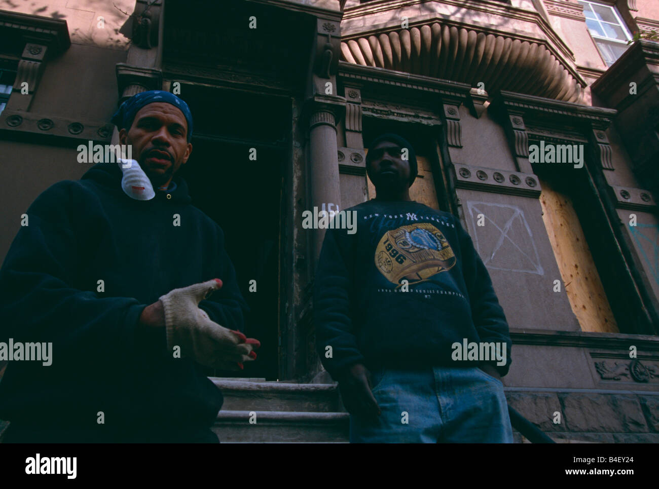 Two men standing on the front steps of a building in New York City, USA ...