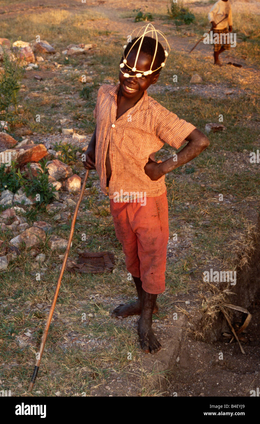 Young boy posing with self-made crown, Rwanda Stock Photo - Alamy