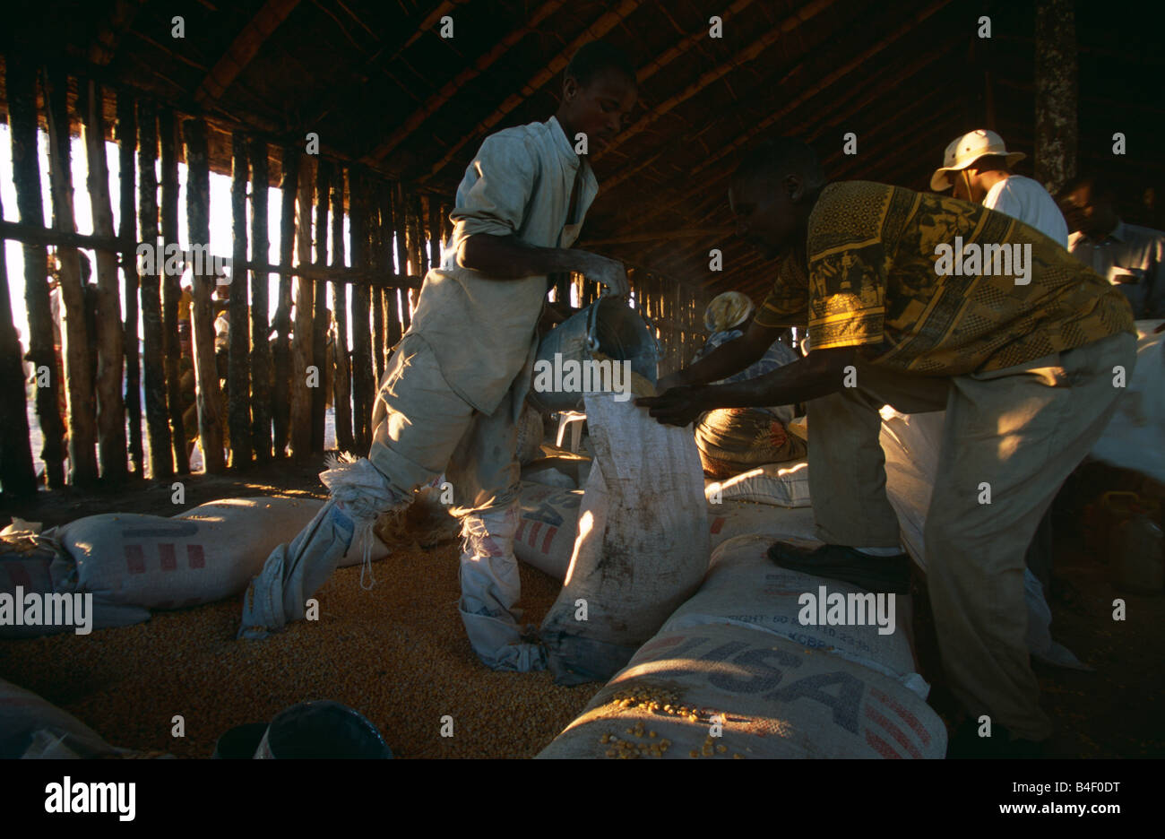 Food distribution for displaced people at a camp in war-ravaged Angola ...