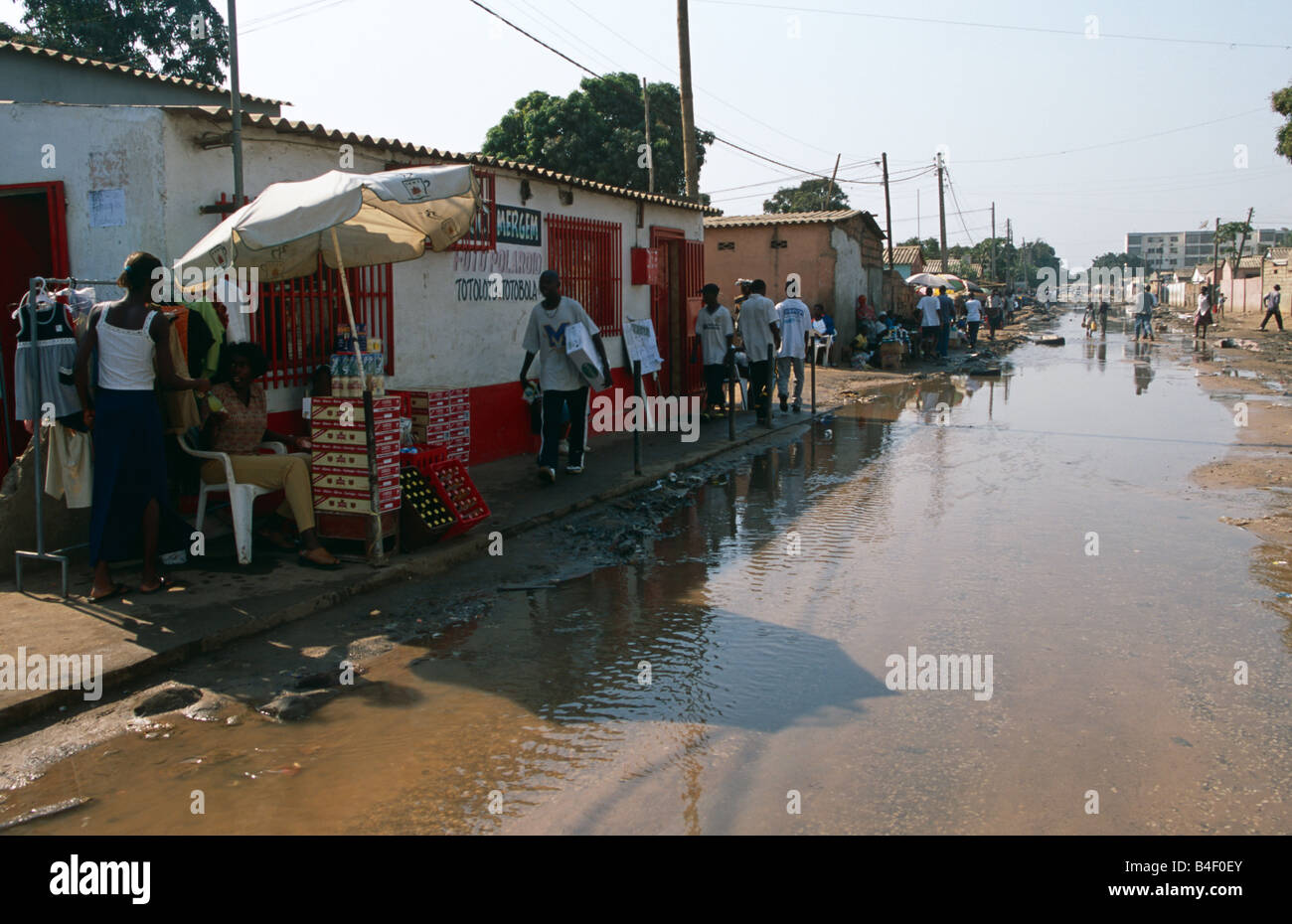 Stalls by flooded street, Angola Stock Photo - Alamy