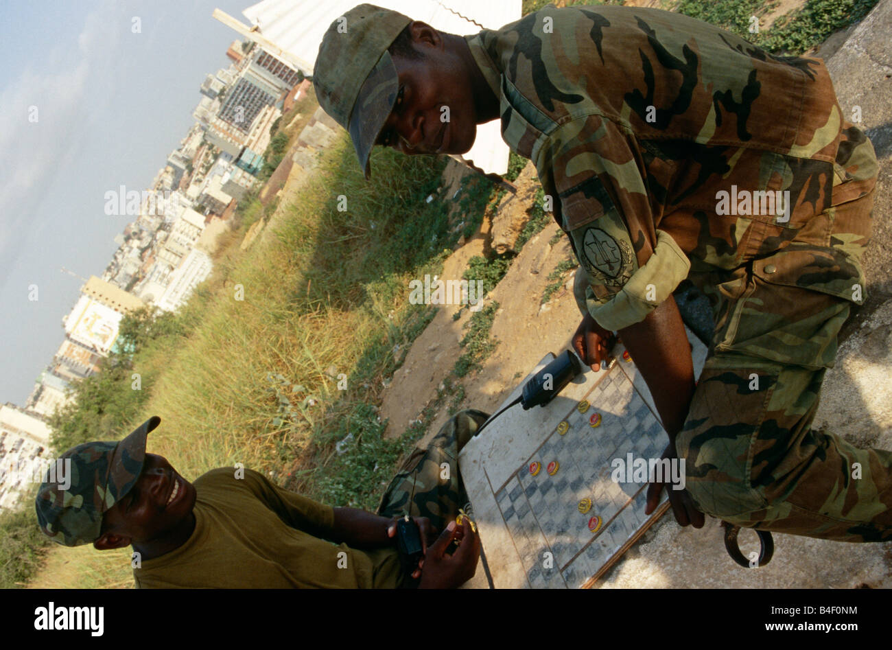 Soldiers playing a board game in Angola Stock Photo - Alamy