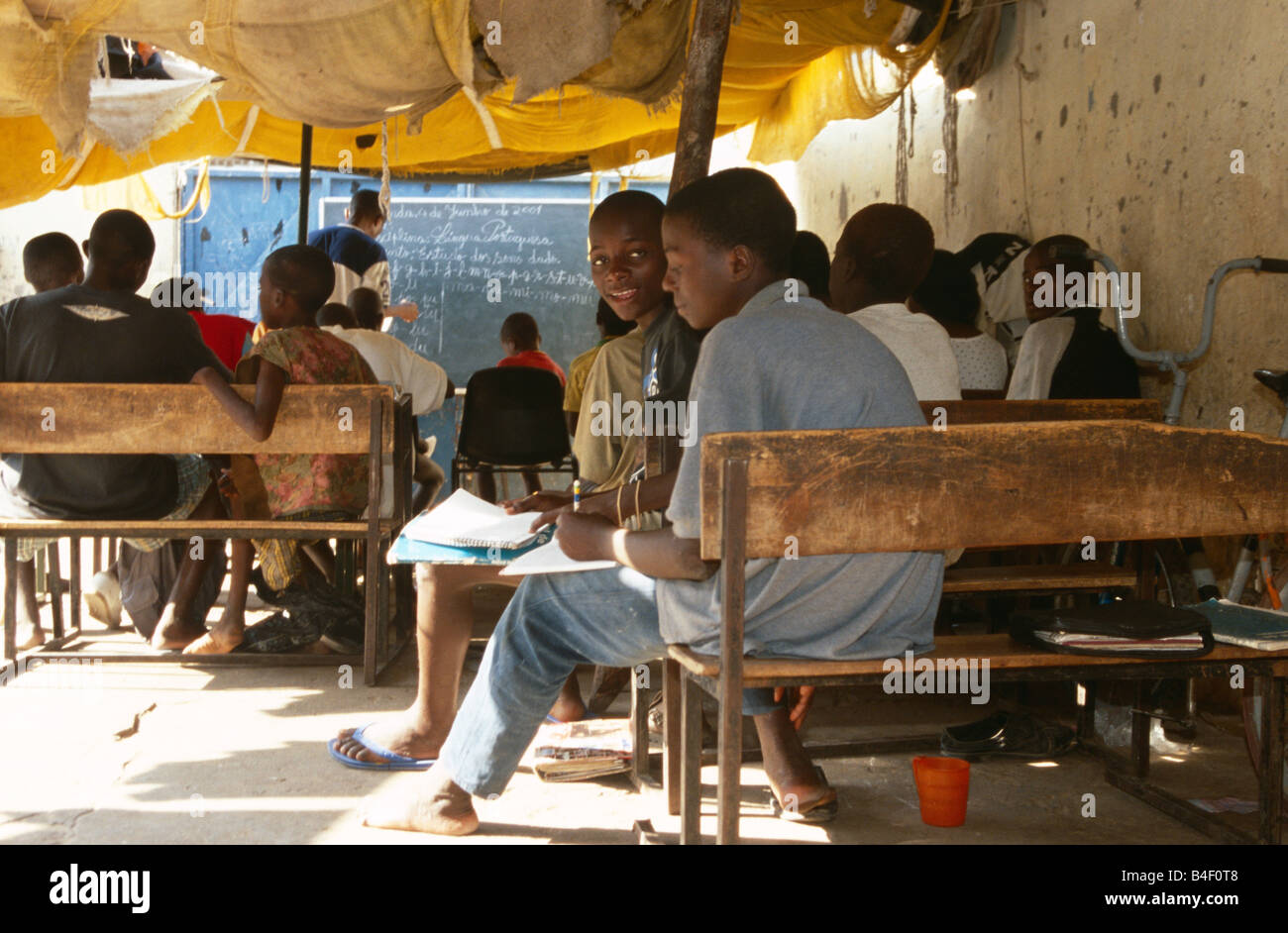 Students at a makeshift classroom in Angola Stock Photo - Alamy