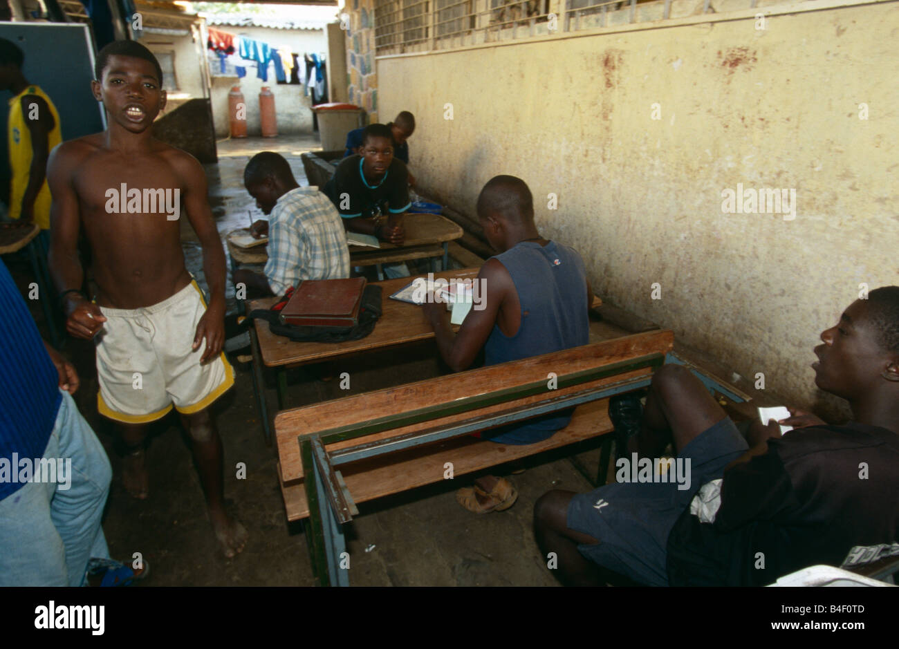Students at a makeshift classroom in Angola Stock Photo - Alamy