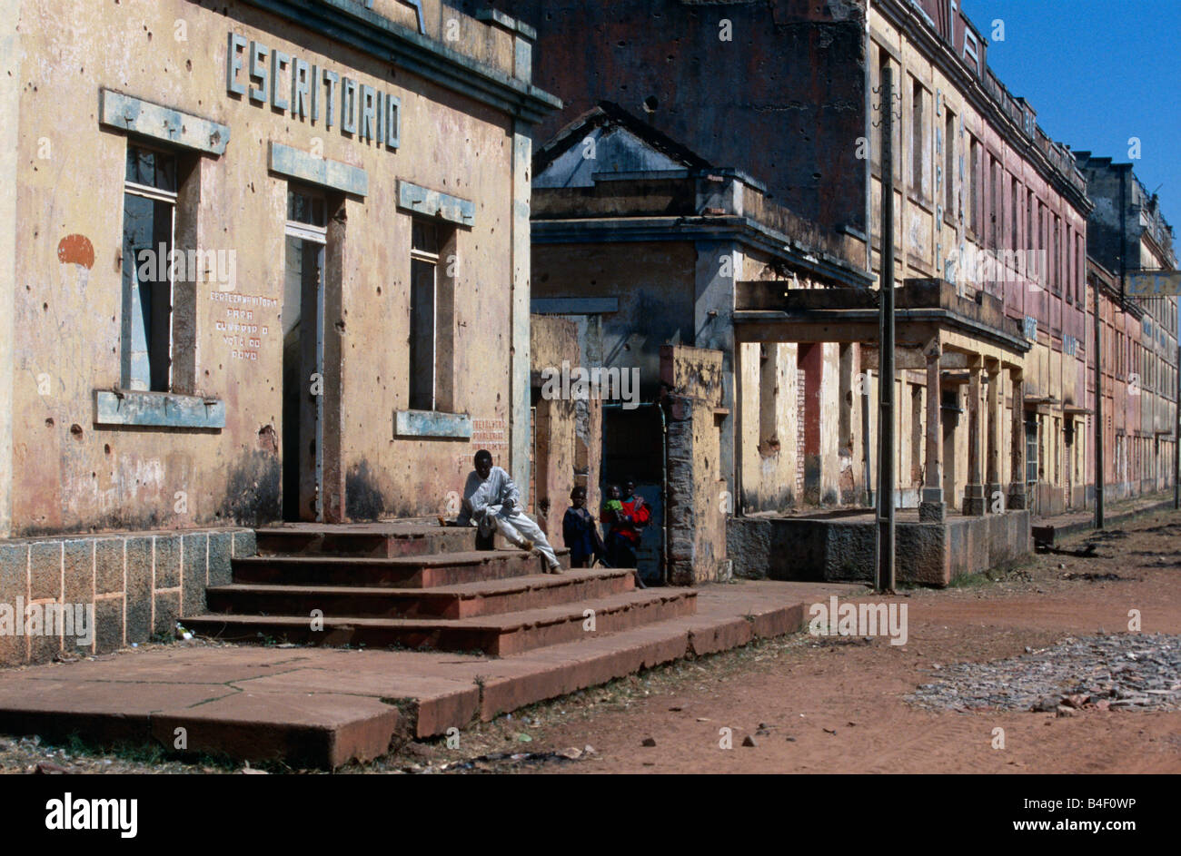 Civil war aftermath street scene with children on steps outside ...