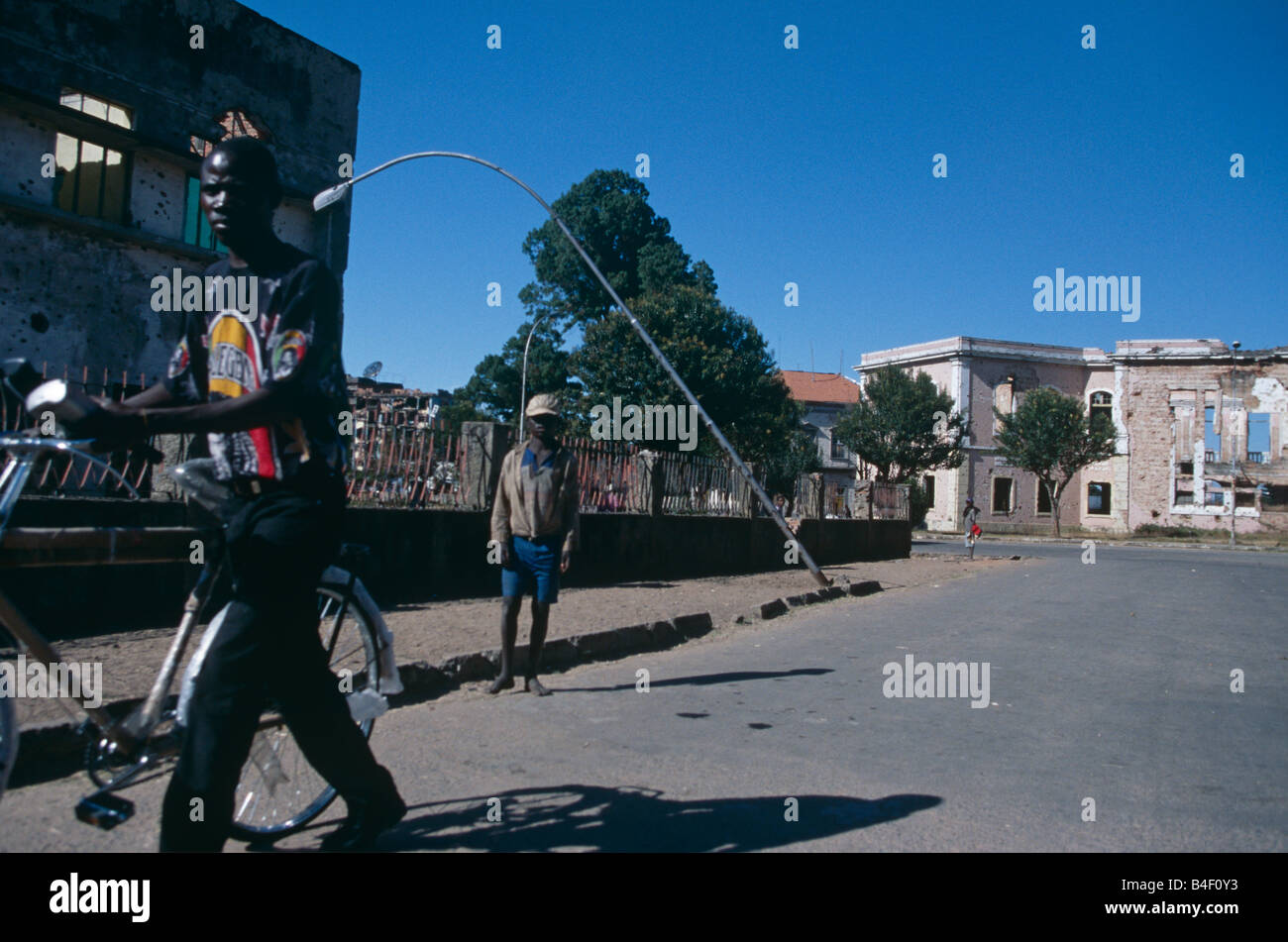 A street scene in Angola showing the damage from the civil war Stock ...