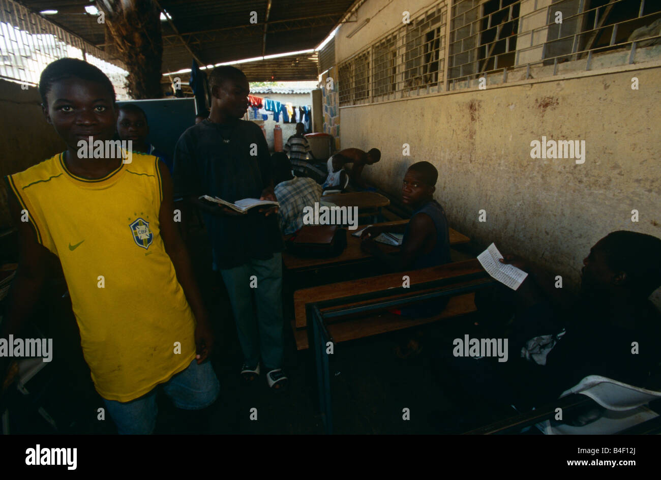 Students at a makeshift classroom in Angola Stock Photo - Alamy
