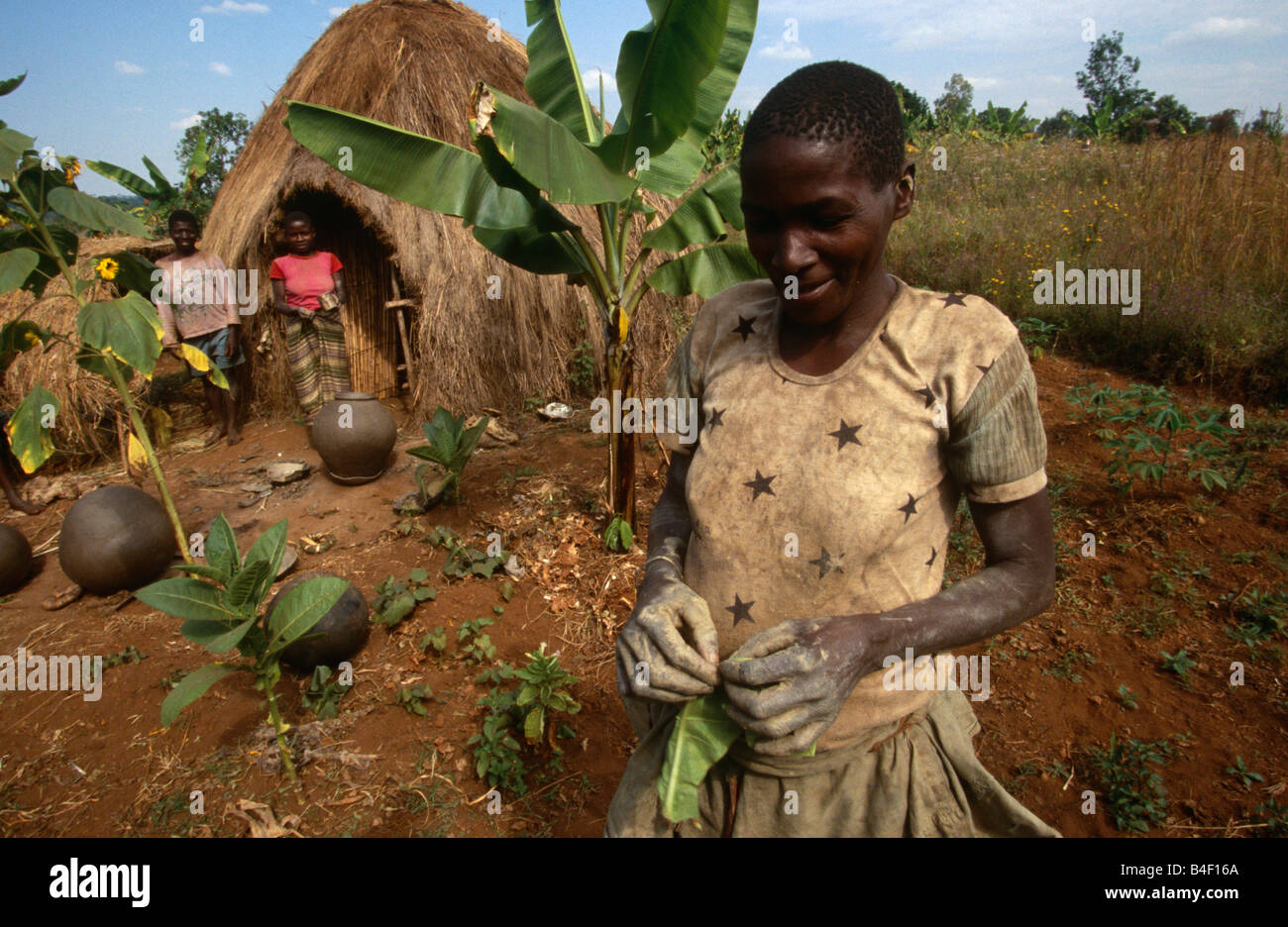 Women in muddy field hi-res stock photography and images - Alamy