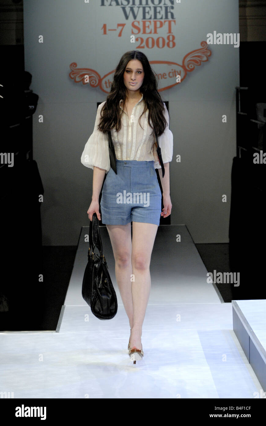 Female model at a fashion show Stock Photo - Alamy