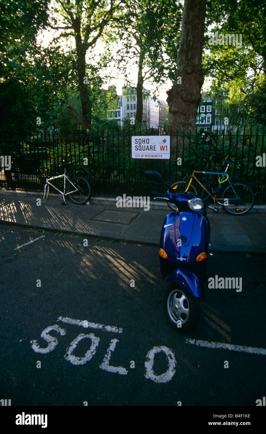 A motorcycle parked in Soho square, London Stock Photo - Alamy