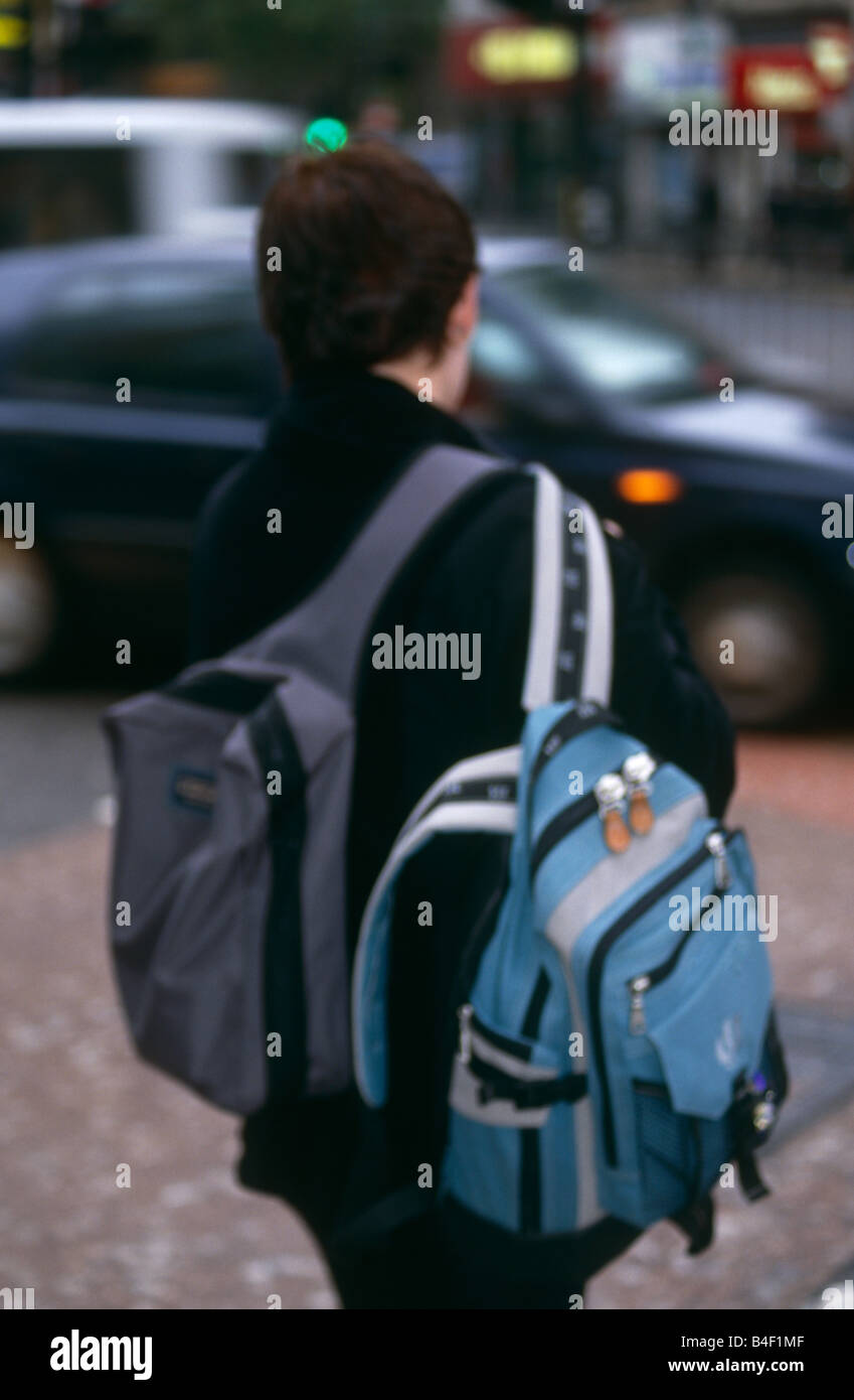 A person carrying bags Stock Photo - Alamy