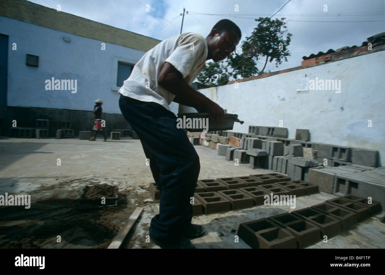 Boy laying bricks hi-res stock photography and images - Alamy