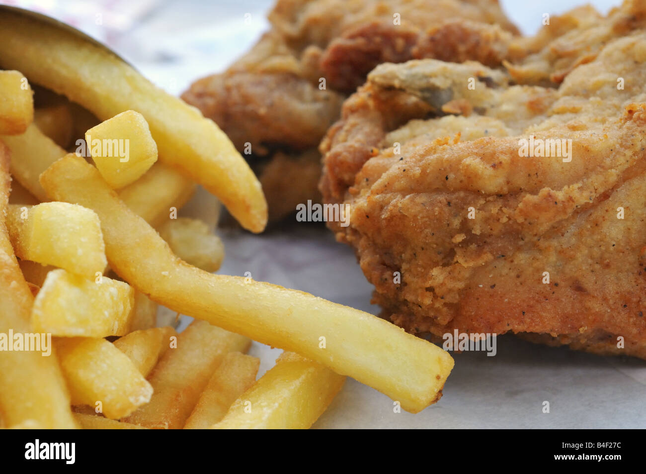 Fast food of fried chicken pieces and French fries Stock Photo - Alamy