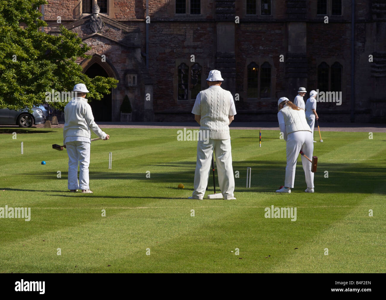 People playing croquet at the Bishop's Palace & Gardens in the City of ...