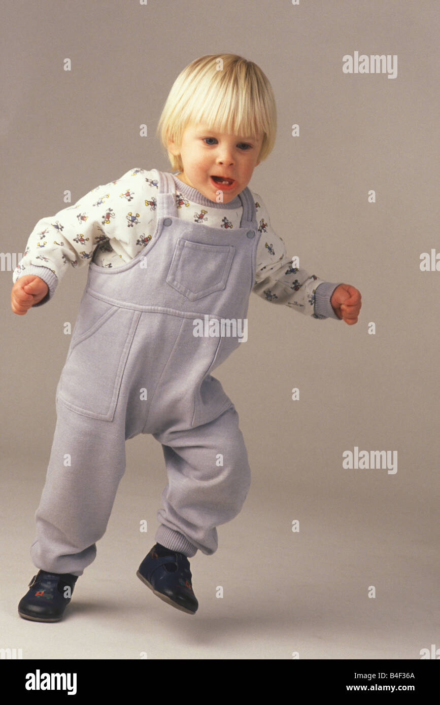 Toddler taking first steps hi-res stock photography and images - Alamy