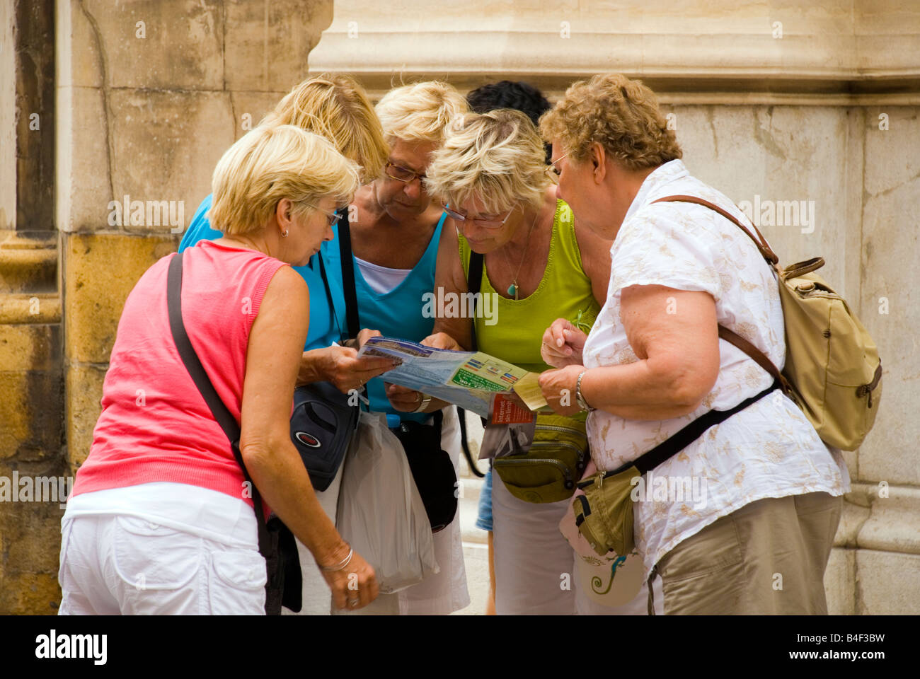 Palma Mallorca Balearic Islands Spain Women tourists consult a guide ...