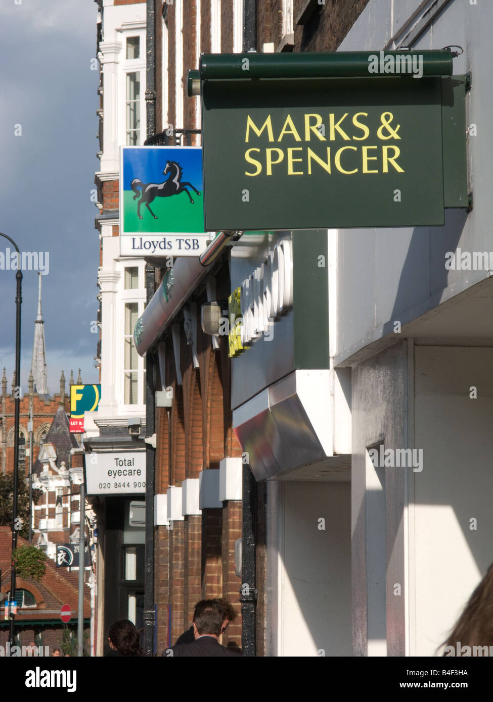 Marks and Spencer shop sign and Lloyds TSB bank sign, together in a ...
