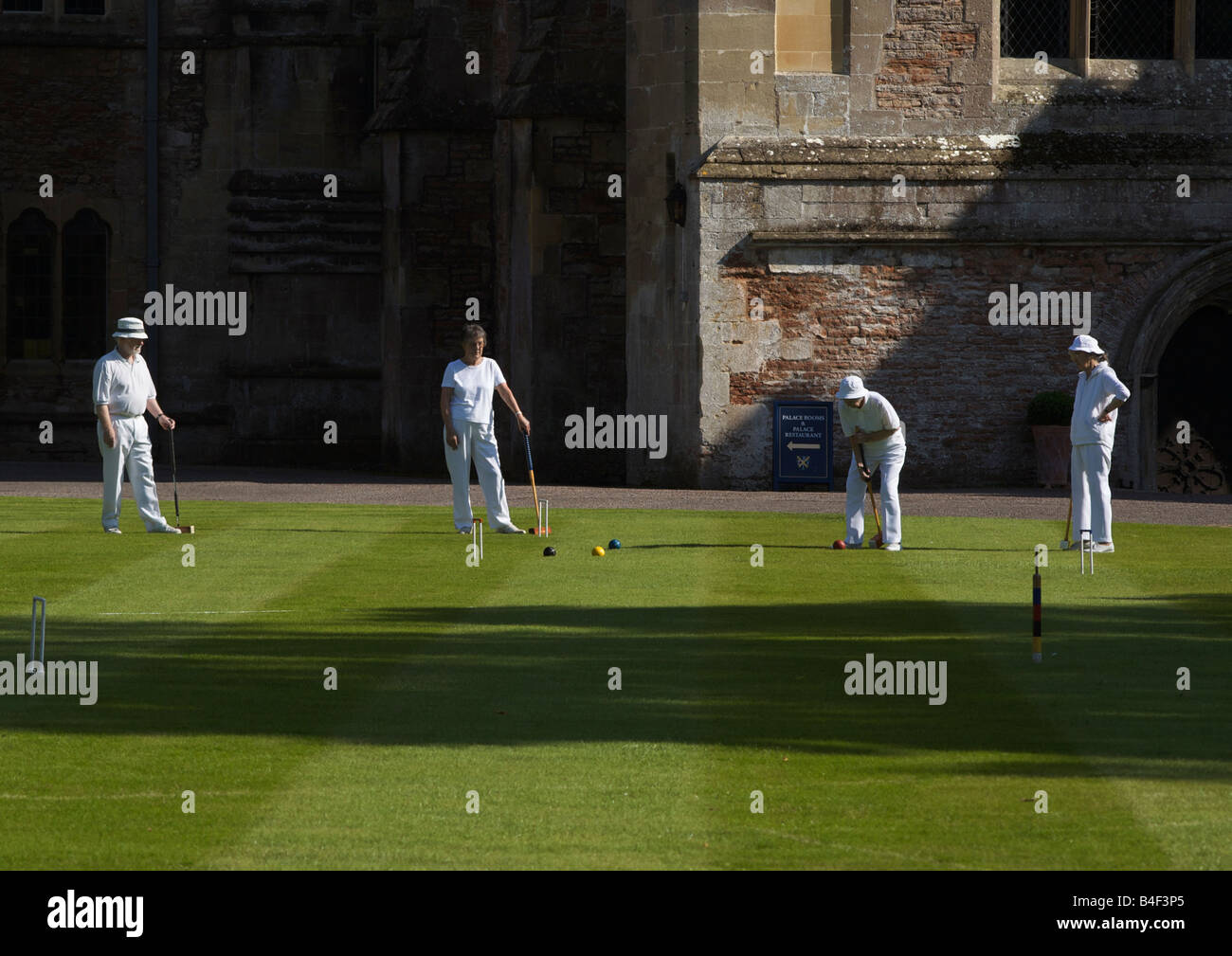 People playing croquet at the Bishop's Palace & Gardens in the City of ...