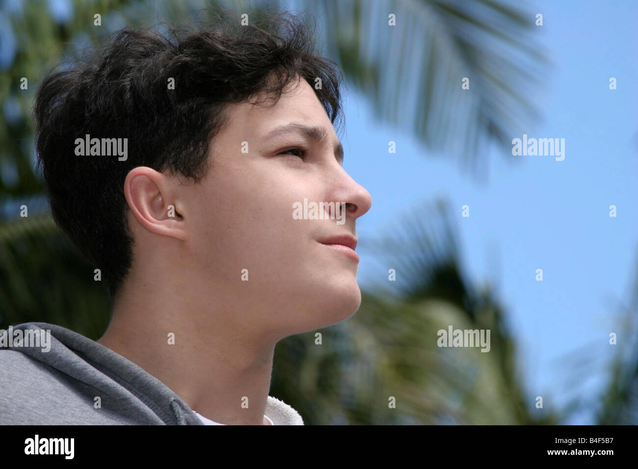 Teenage boy looking forward Stock Photo - Alamy