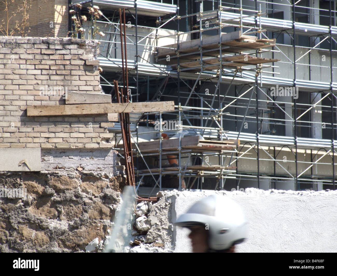 scaffolding and damaged brick wall Stock Photo - Alamy