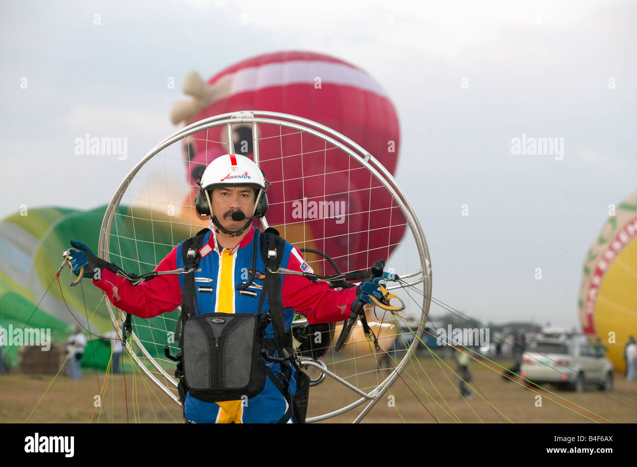 Paramotor pilot prepares to take off Stock Photo - Alamy