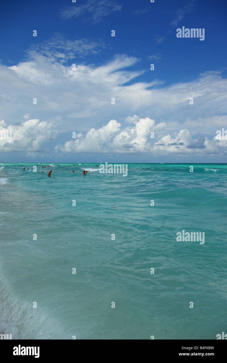 Swimmers in the Atlantic Ocean in the waters off of South Beach in ...