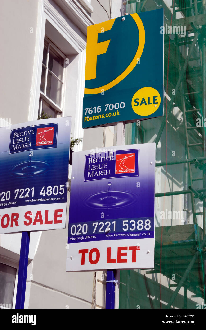Property for sale and to let signs, London Stock Photo - Alamy