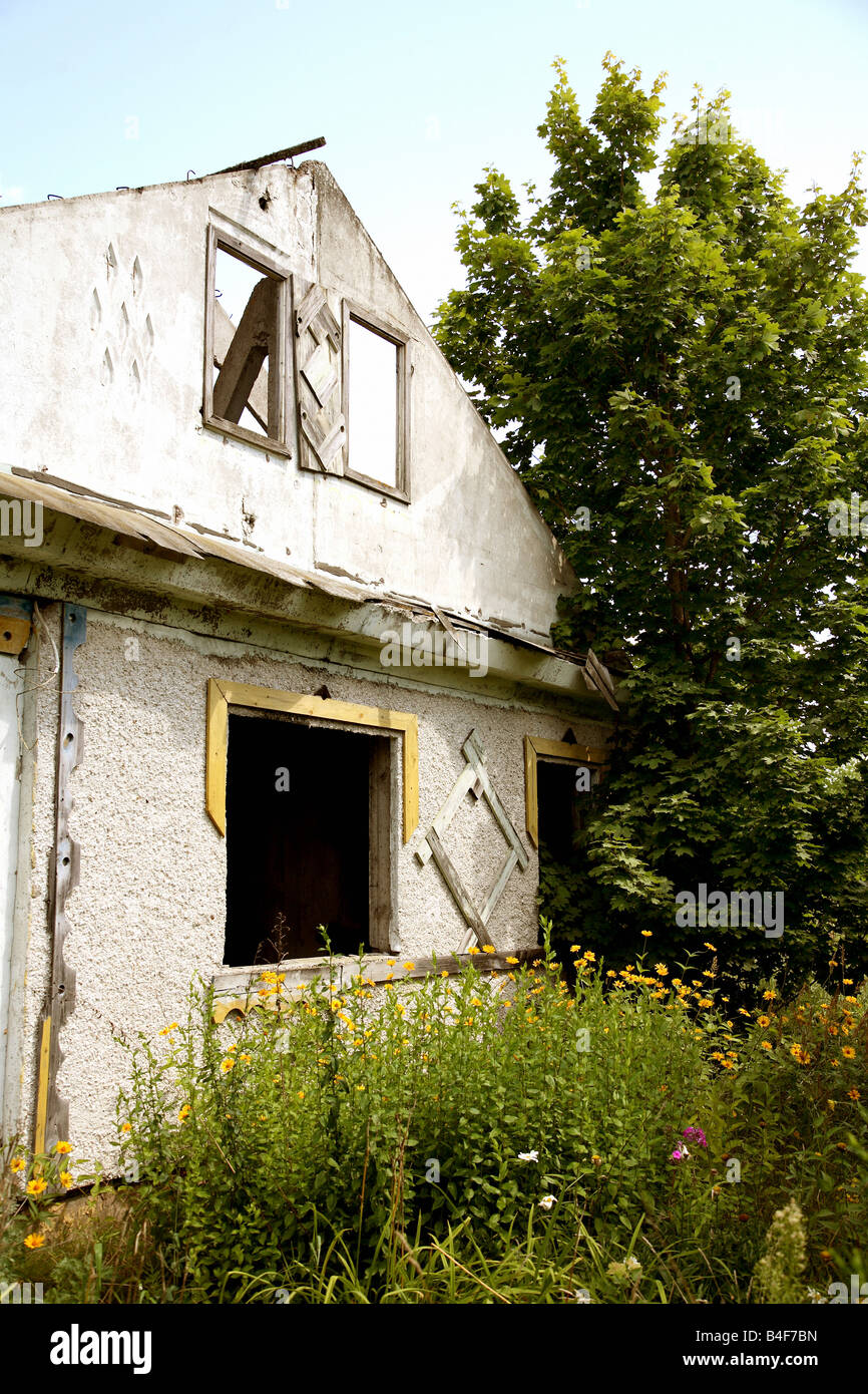An abandoned house in the restricted radioactive zone near Gomel ...