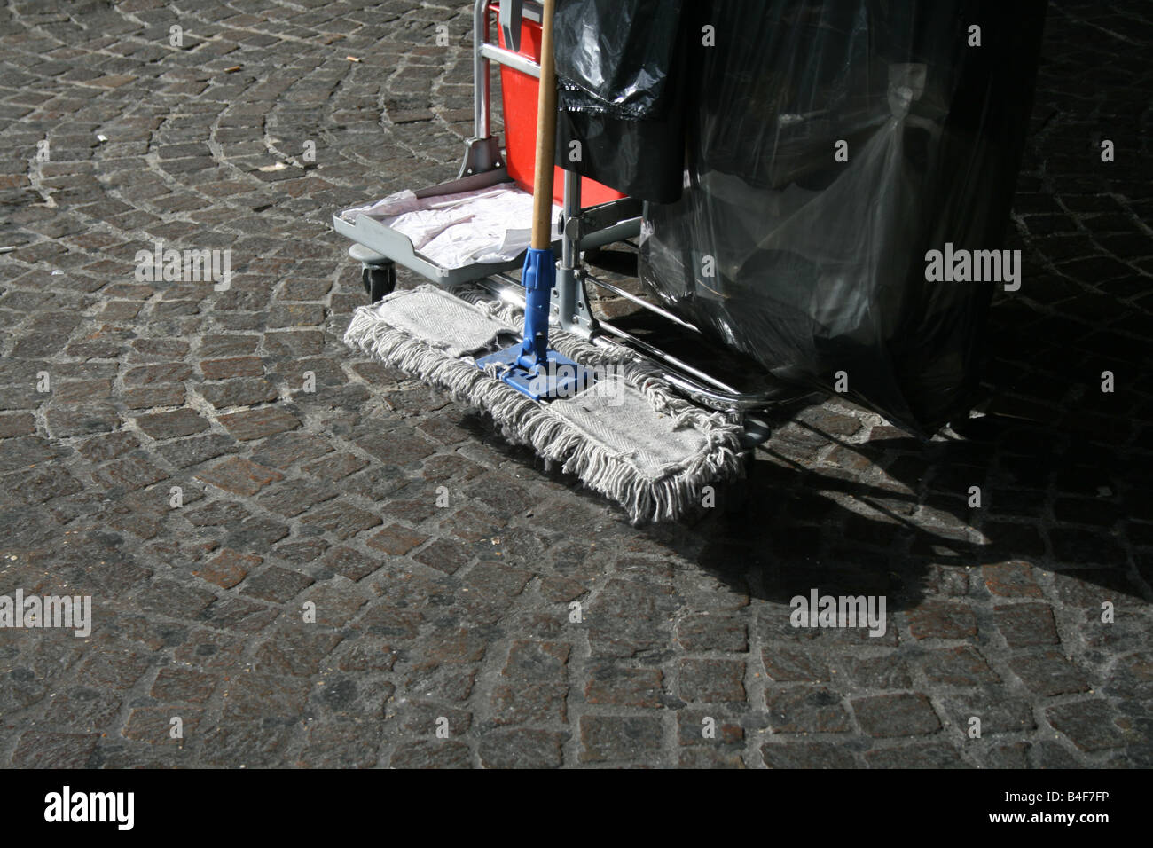 Push street cleaner hi-res stock photography and images - Alamy