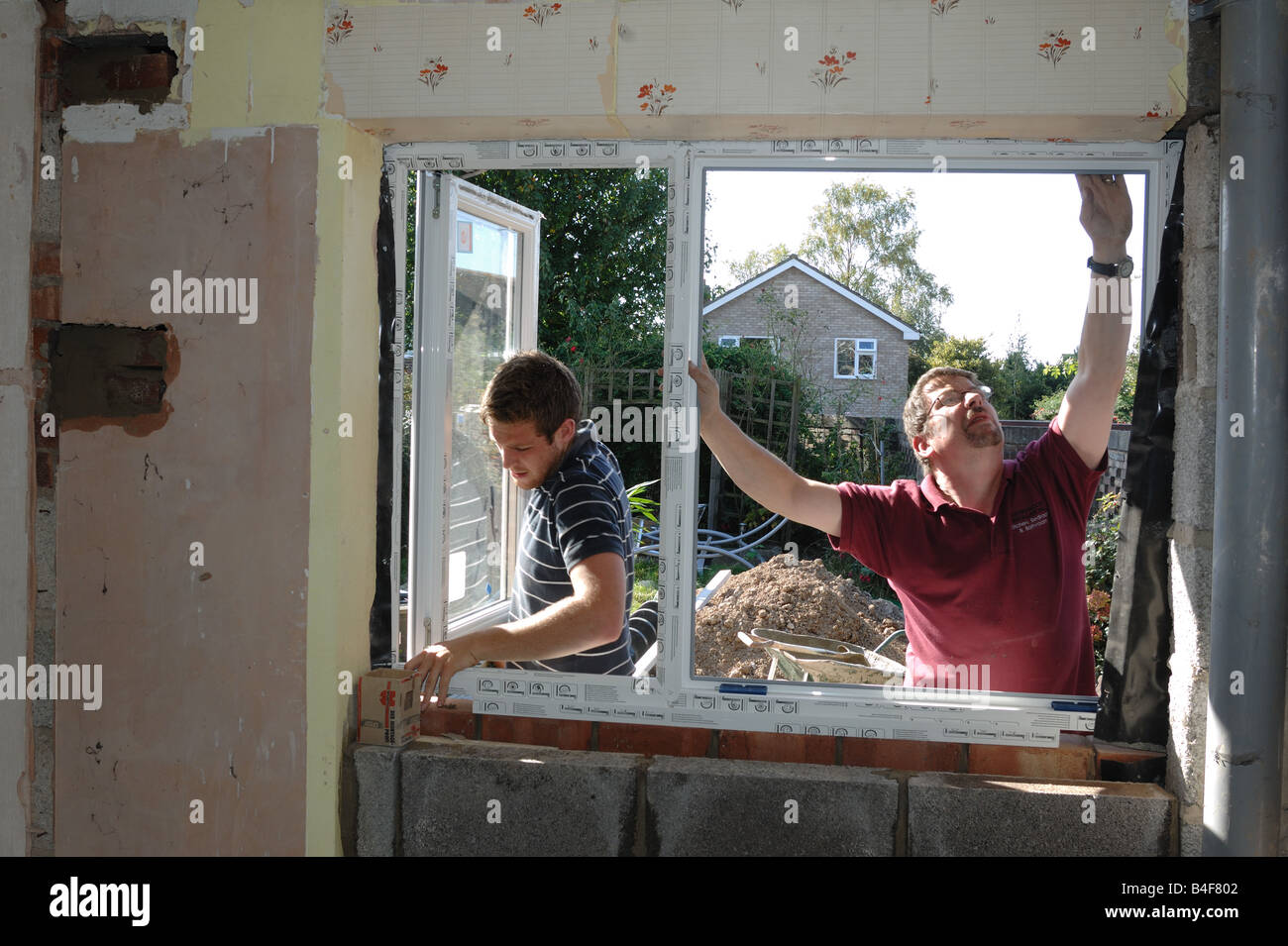 Fitting a double glazed window in a house extension in Thornbury ...