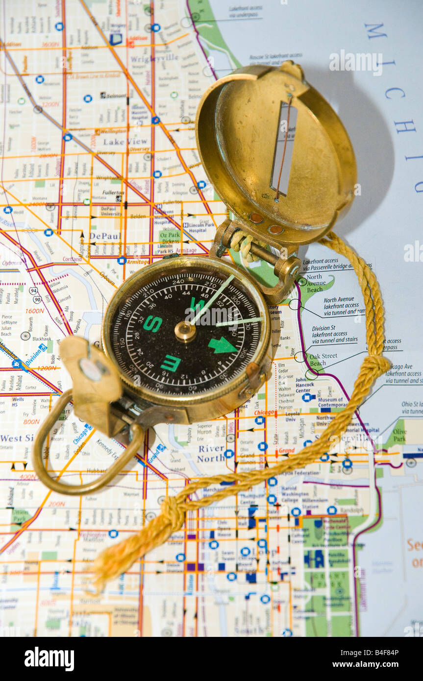 Antique brass compass on map hi-res stock photography and images - Alamy