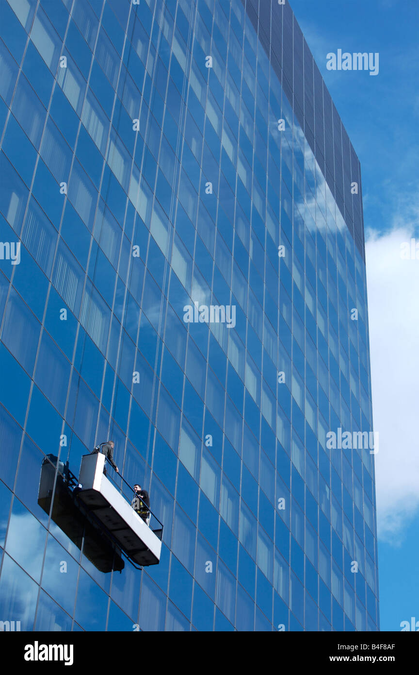 Cleaning the windows of a London city building Stock Photo - Alamy