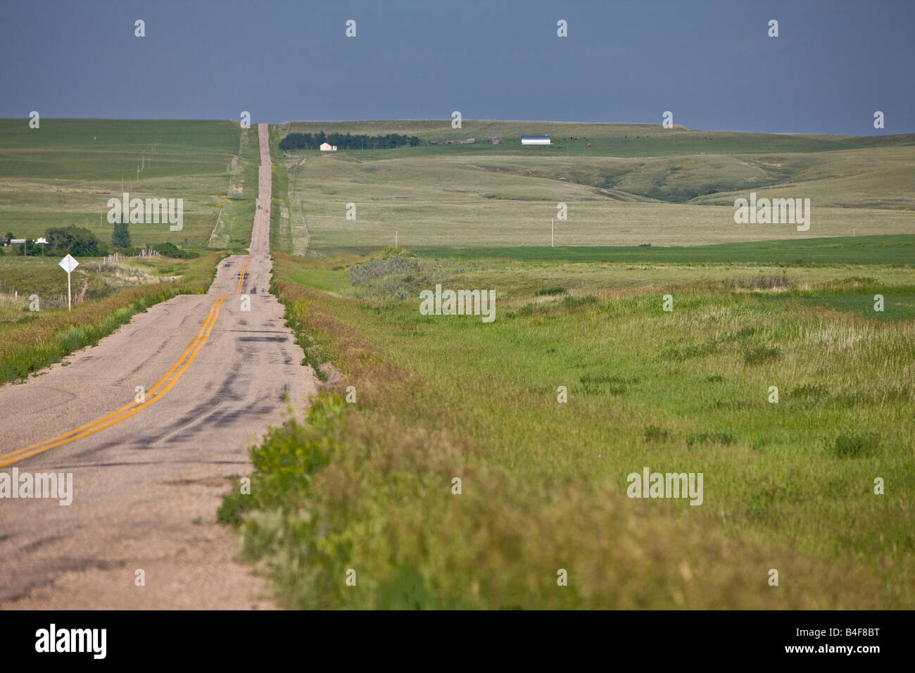 Road through the Big Muddy Badlands region of Southern Saskatchewan ...