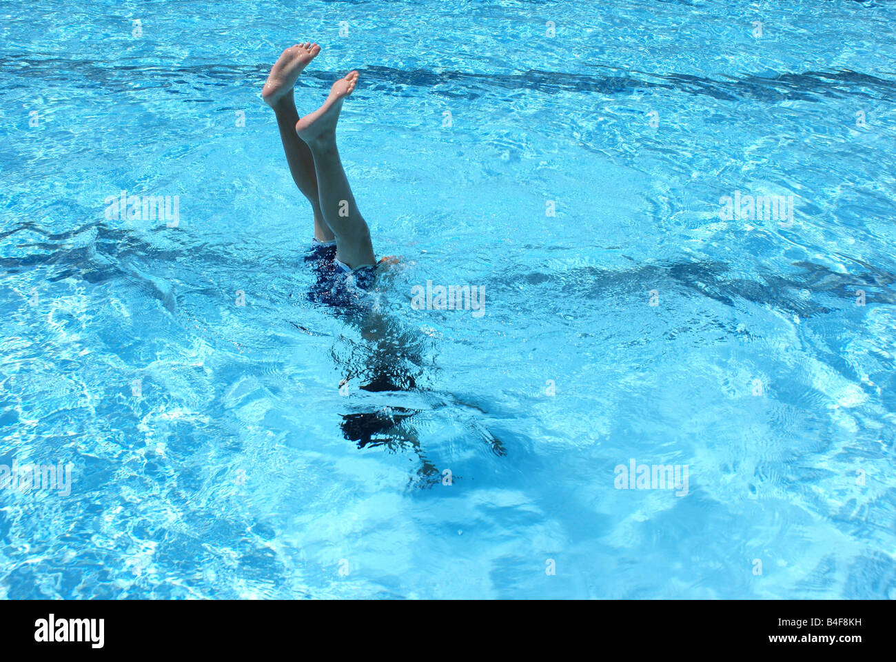 Getting a leg up Stock Photo - Alamy