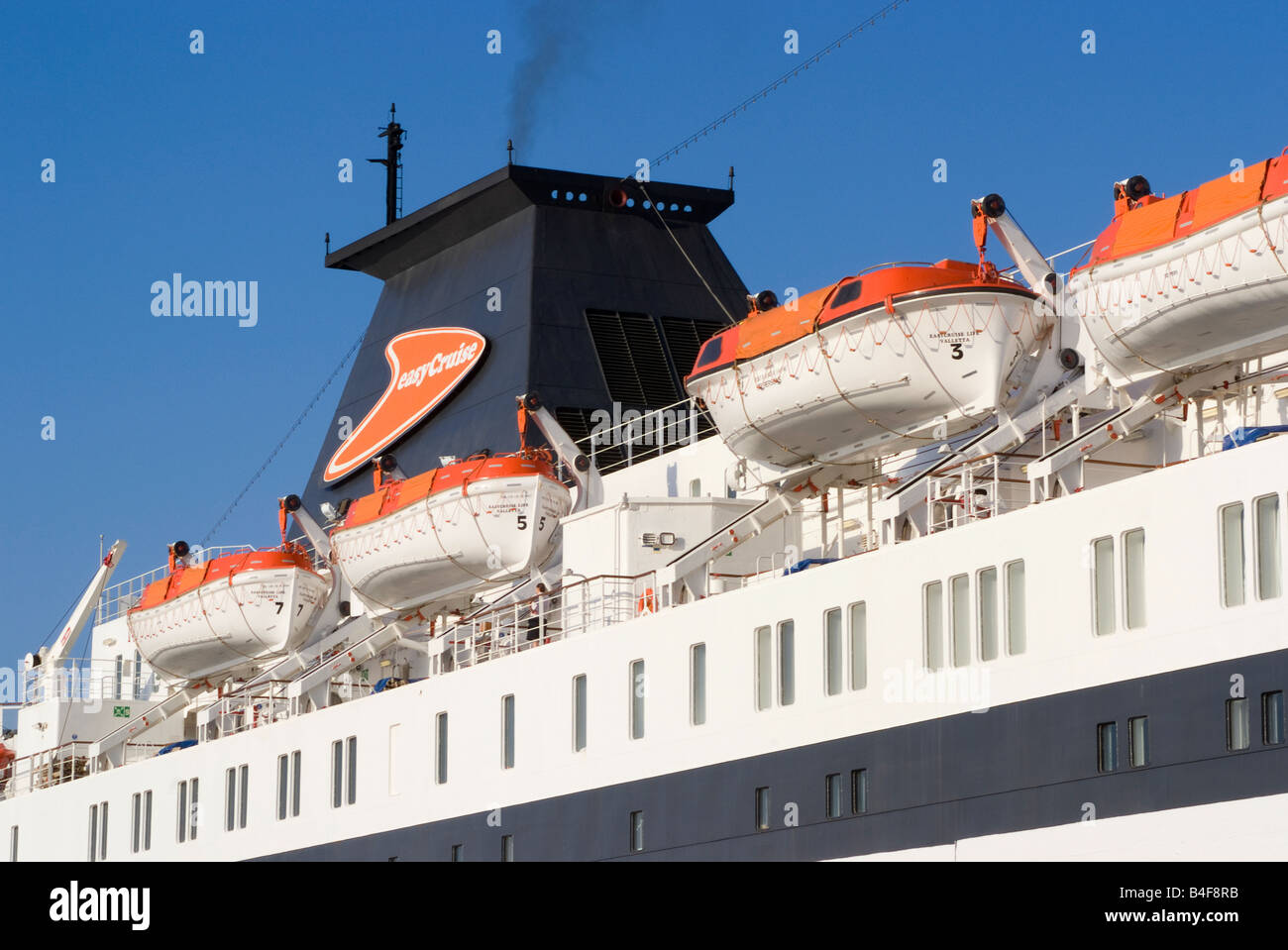 Easycruise Life Cruise Ship with Funnel and Lifeboats at Paros Town ...