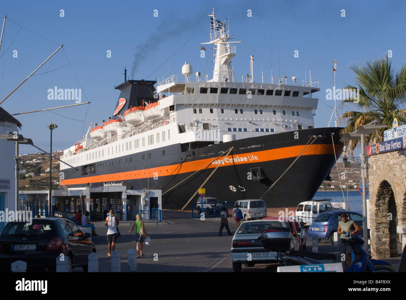 Easycruise Life Cruise Ship and Windmill Docked at Paros Town Harbour ...