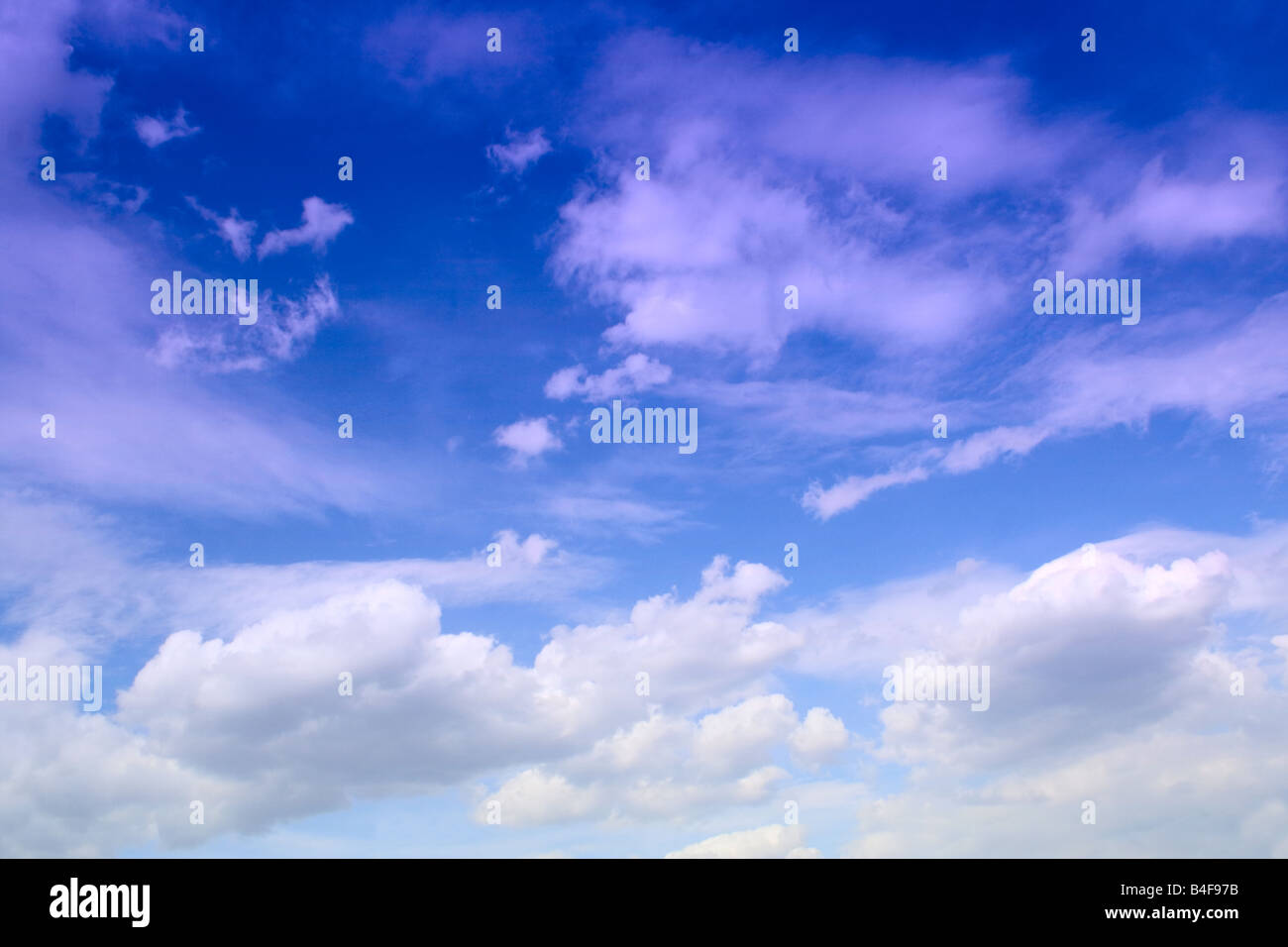 Indigo sky with clouds Stock Photo - Alamy