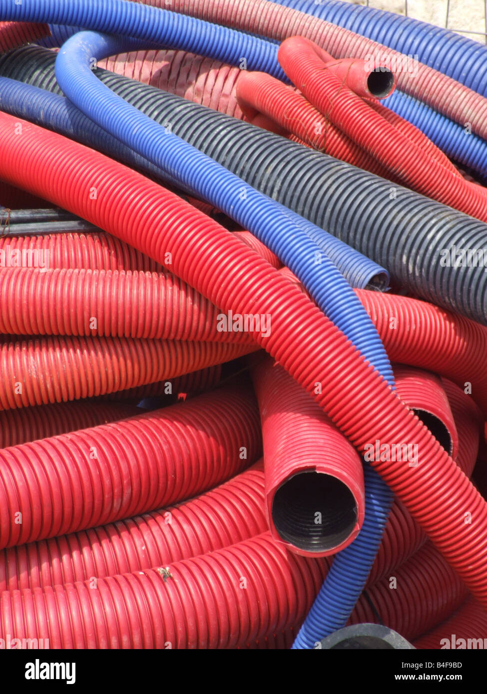 close up detail of long water pipes tubes on floor Stock Photo - Alamy