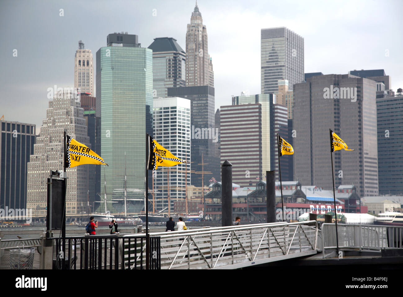 Downtown Manhattan skyline viewed through the NY Water Taxi dock on the ...