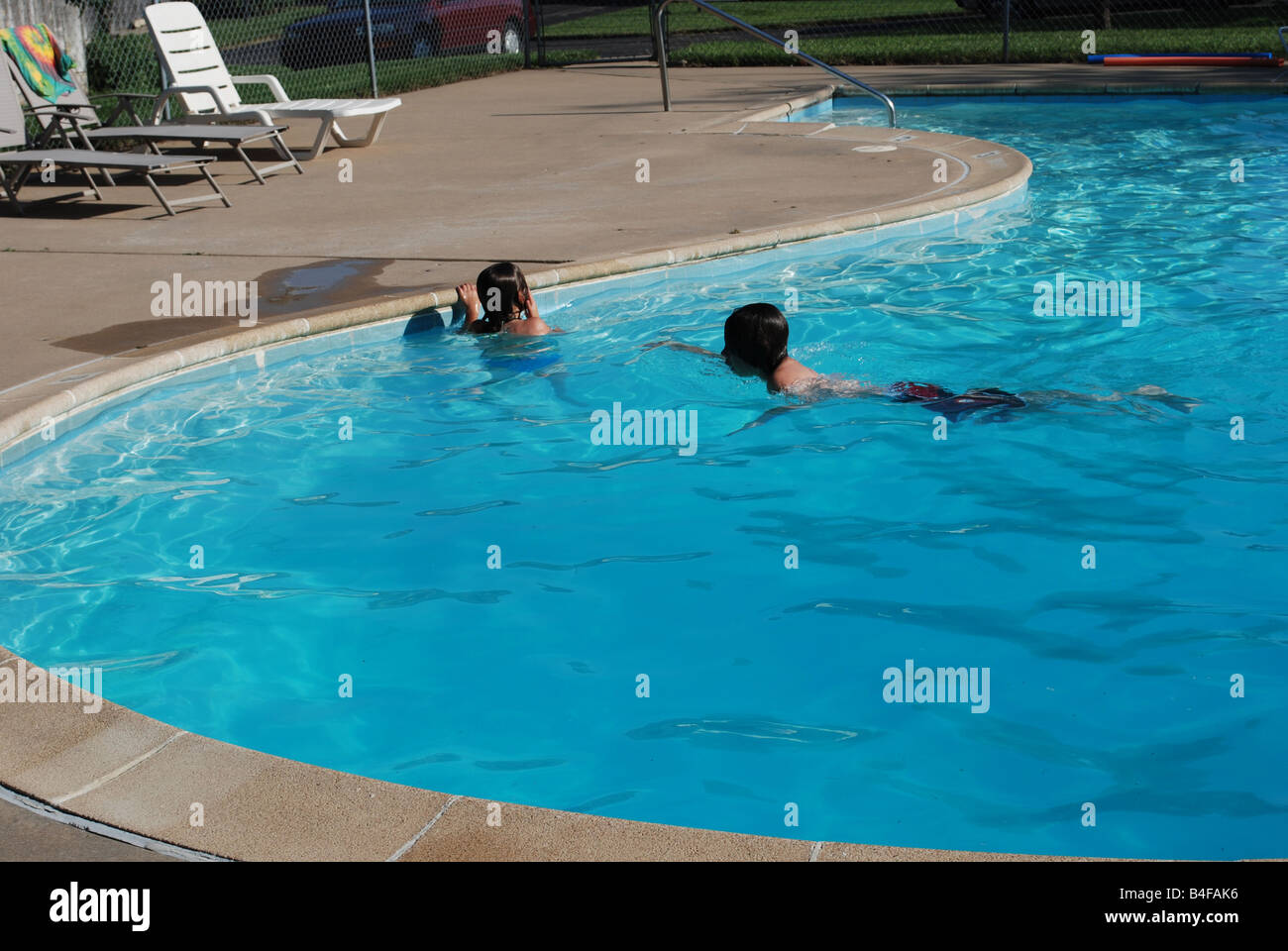 People in pool hi-res stock photography and images - Alamy