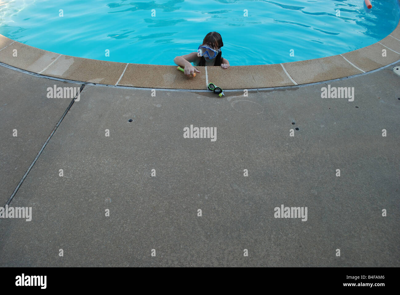 young person in pool Stock Photo - Alamy