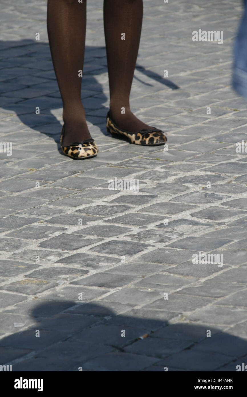 one person walking in street in city town Stock Photo - Alamy