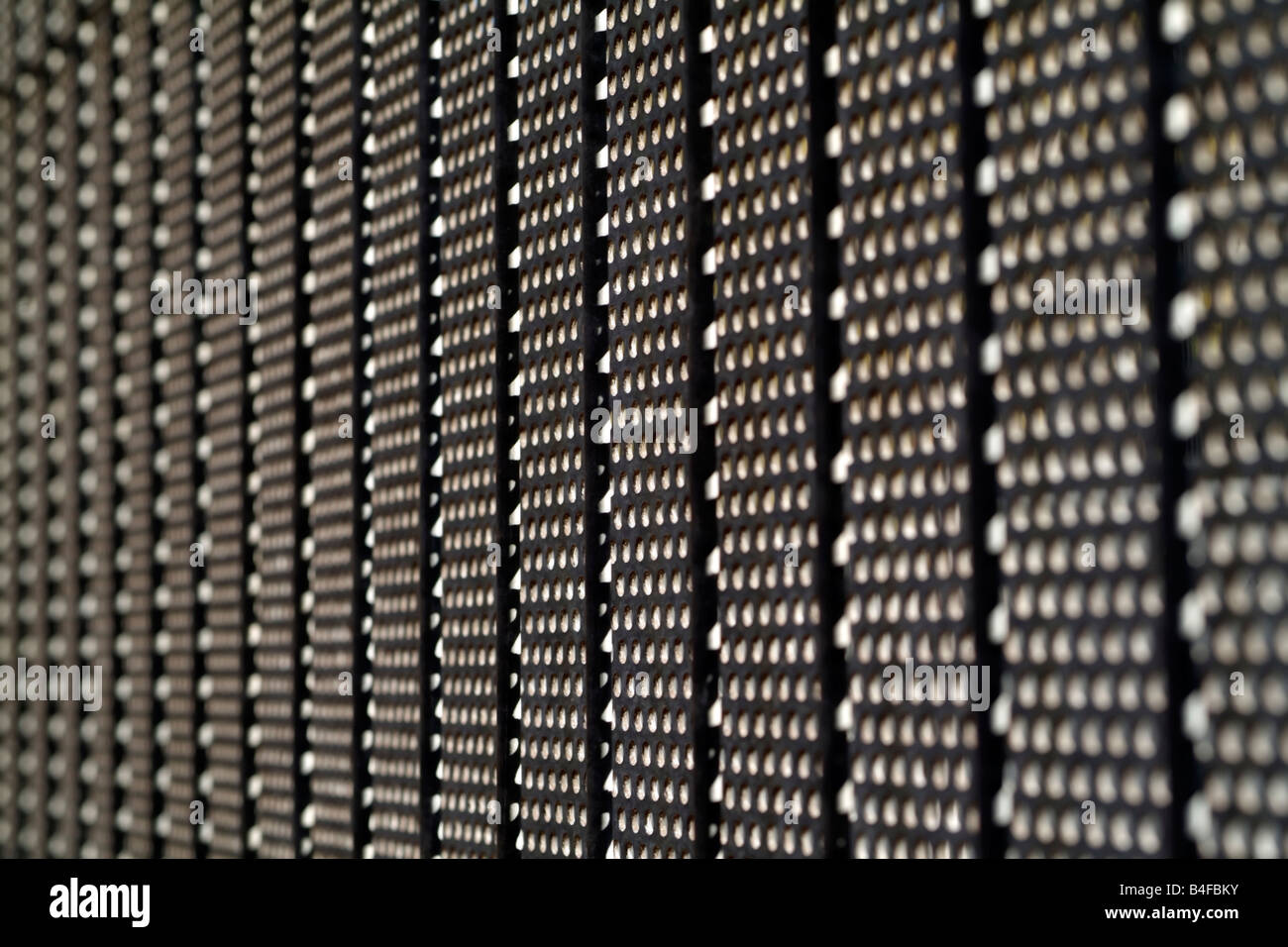 Metal fence with holes hi-res stock photography and images - Alamy