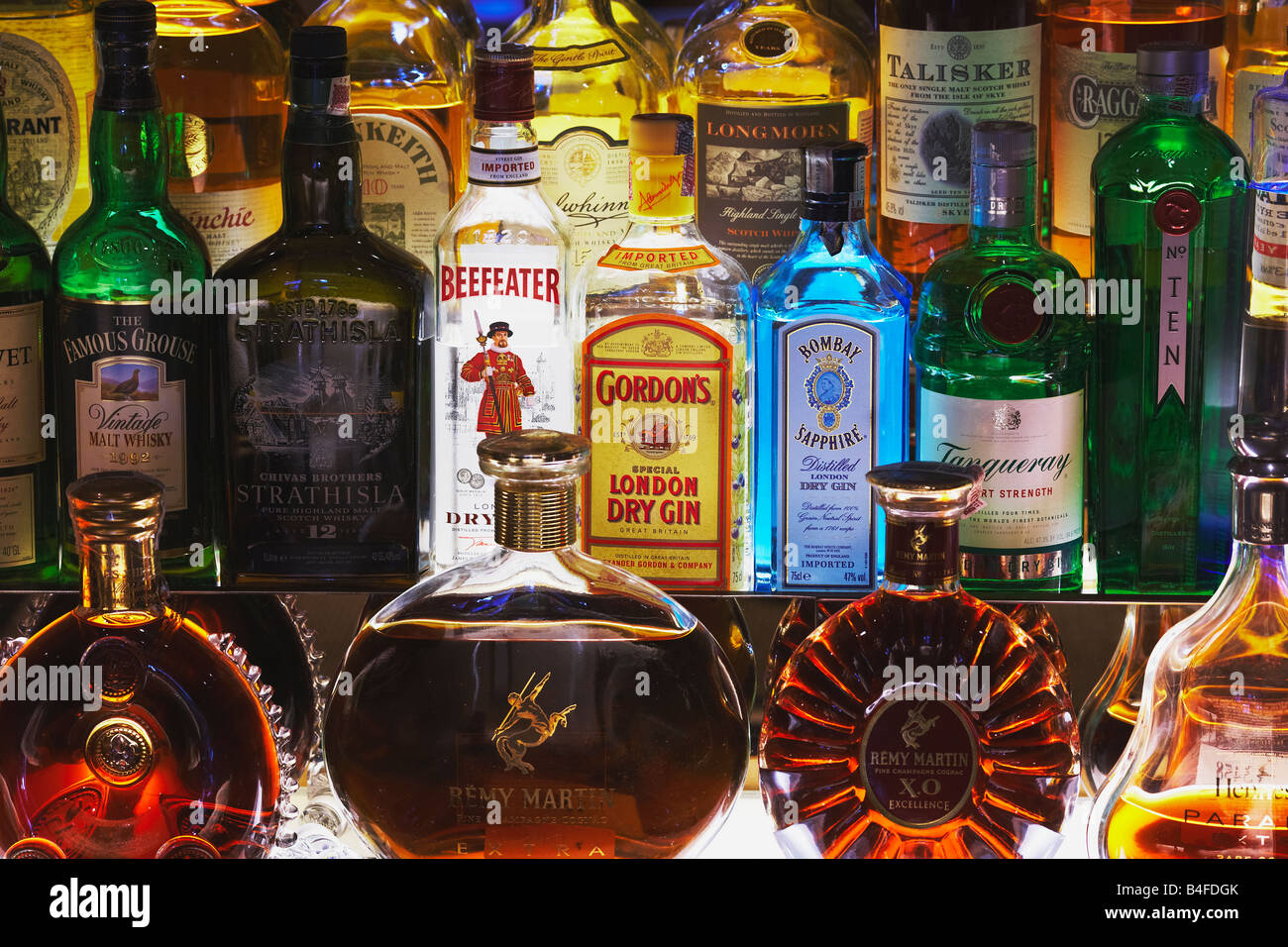 A bar full of bottles of spirits and alcohol Stock Photo - Alamy