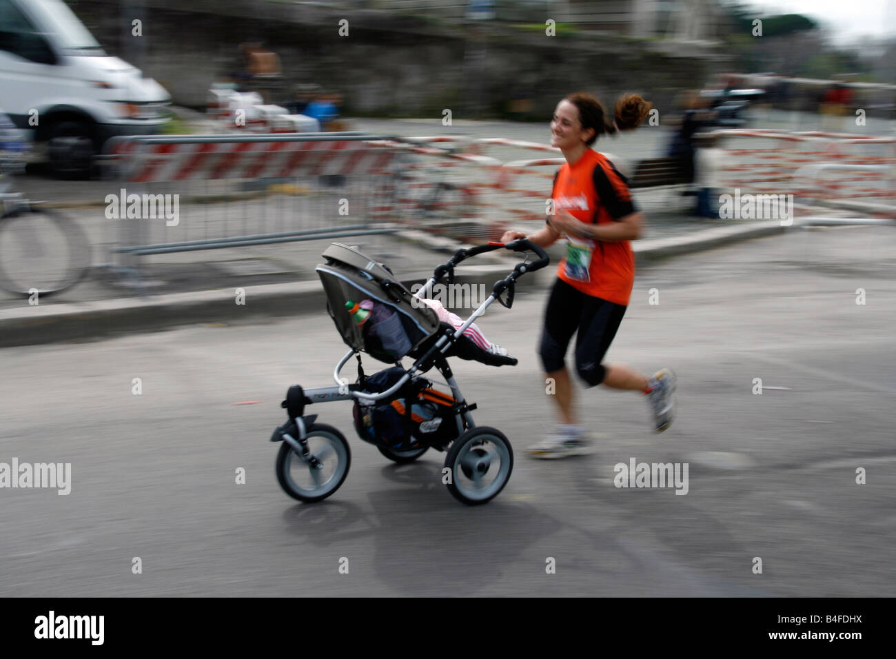 Woman pushing pram in hi-res stock photography and images - Alamy