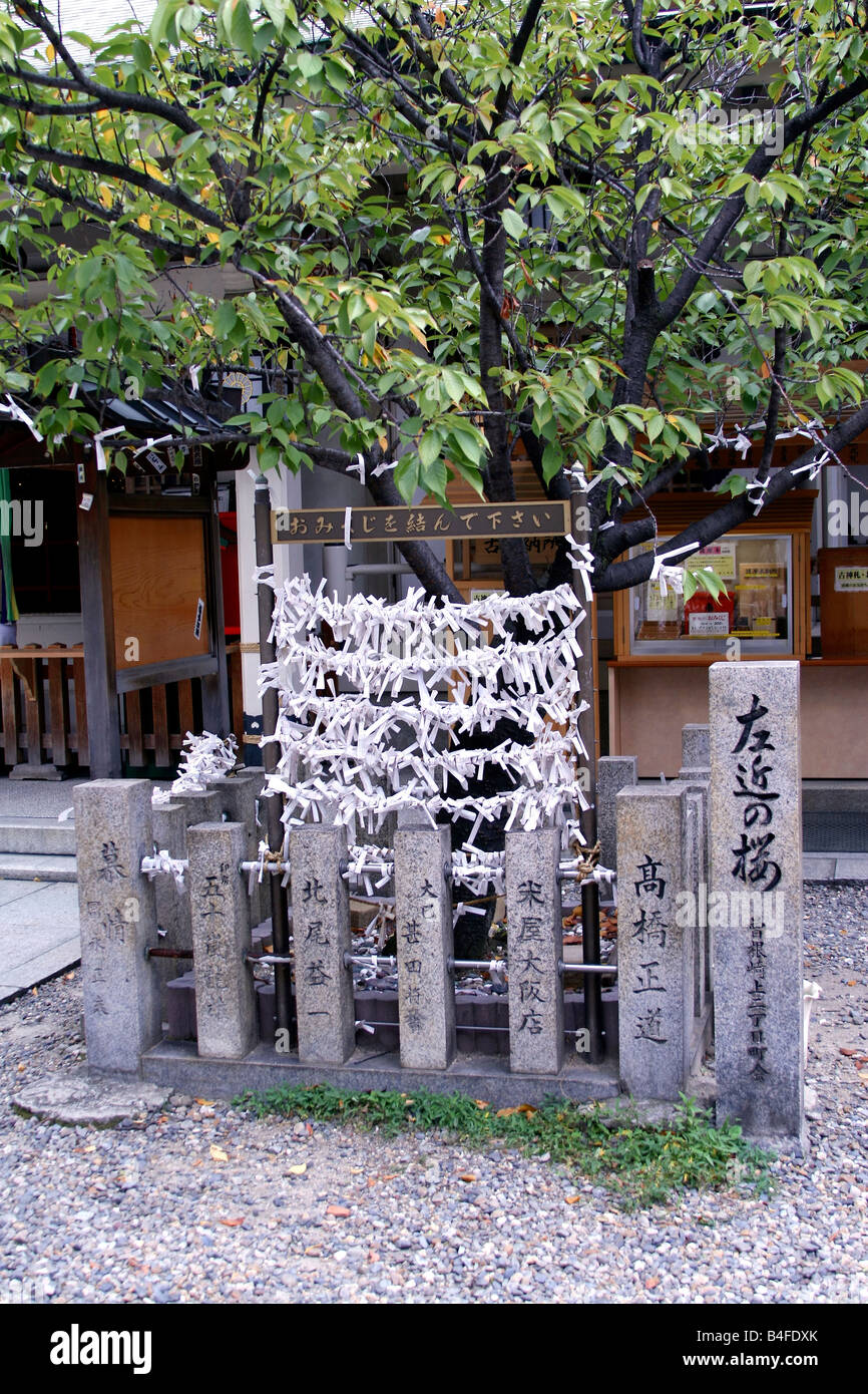 Japanese Shinto Shrine Omikuji Fortune Telling Paper Slips Osaka, Japan Stock Photo - Alamy