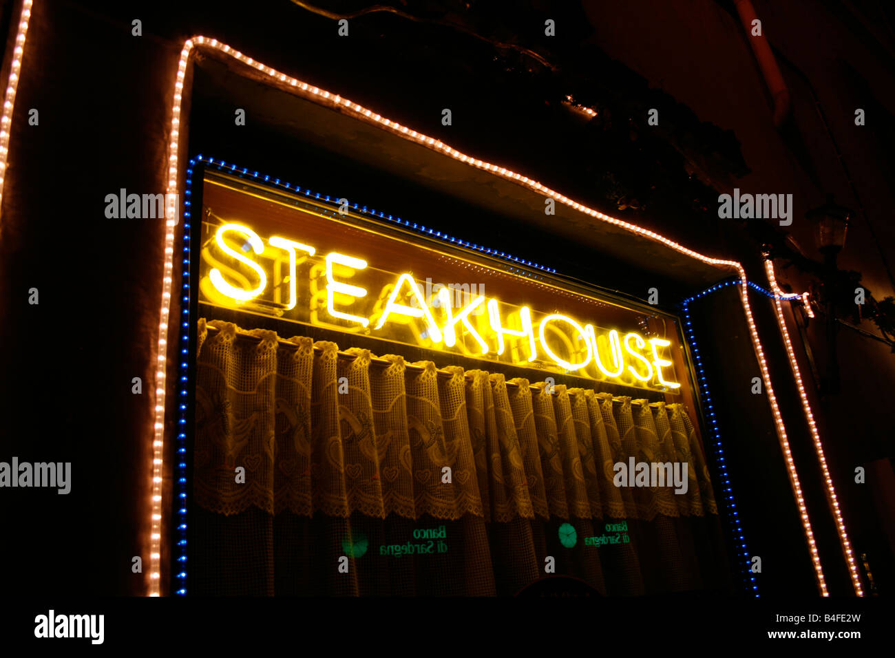 steakhouse restaurant window at night Stock Photo - Alamy