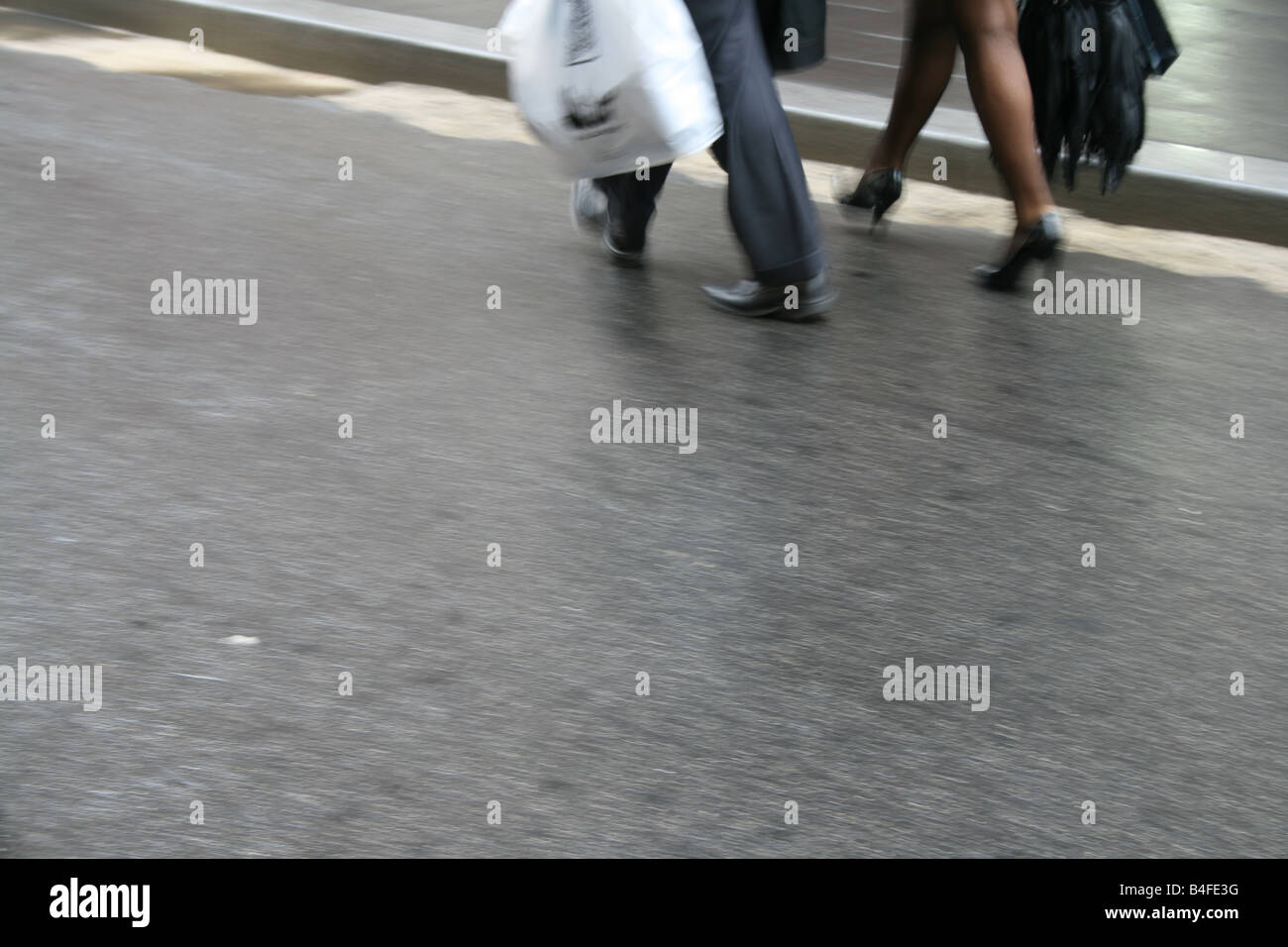 one person walking in street in city town Stock Photo - Alamy