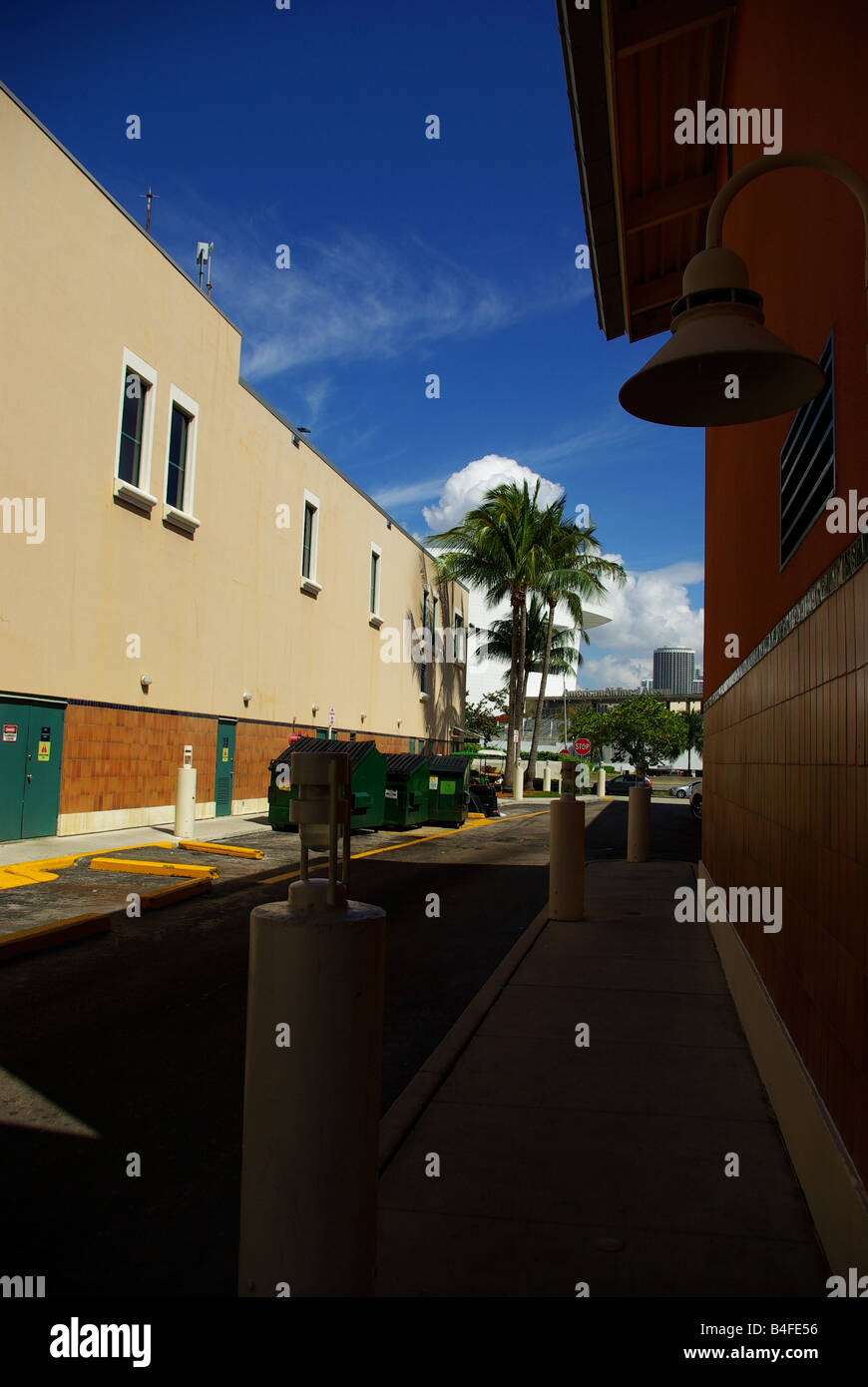 Alley behind a downtown shopping mall Stock Photo - Alamy