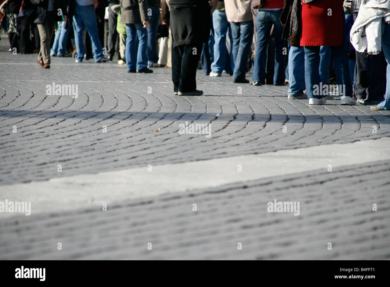 people standing in a queue in town Stock Photo - Alamy